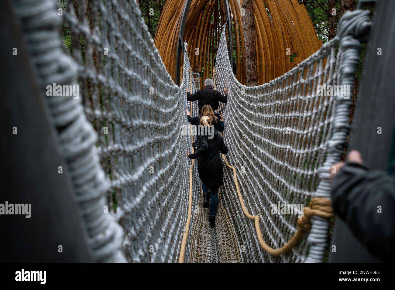 In this Monday, Oct. 1, 208, people explore the pods in the canopy walk ...