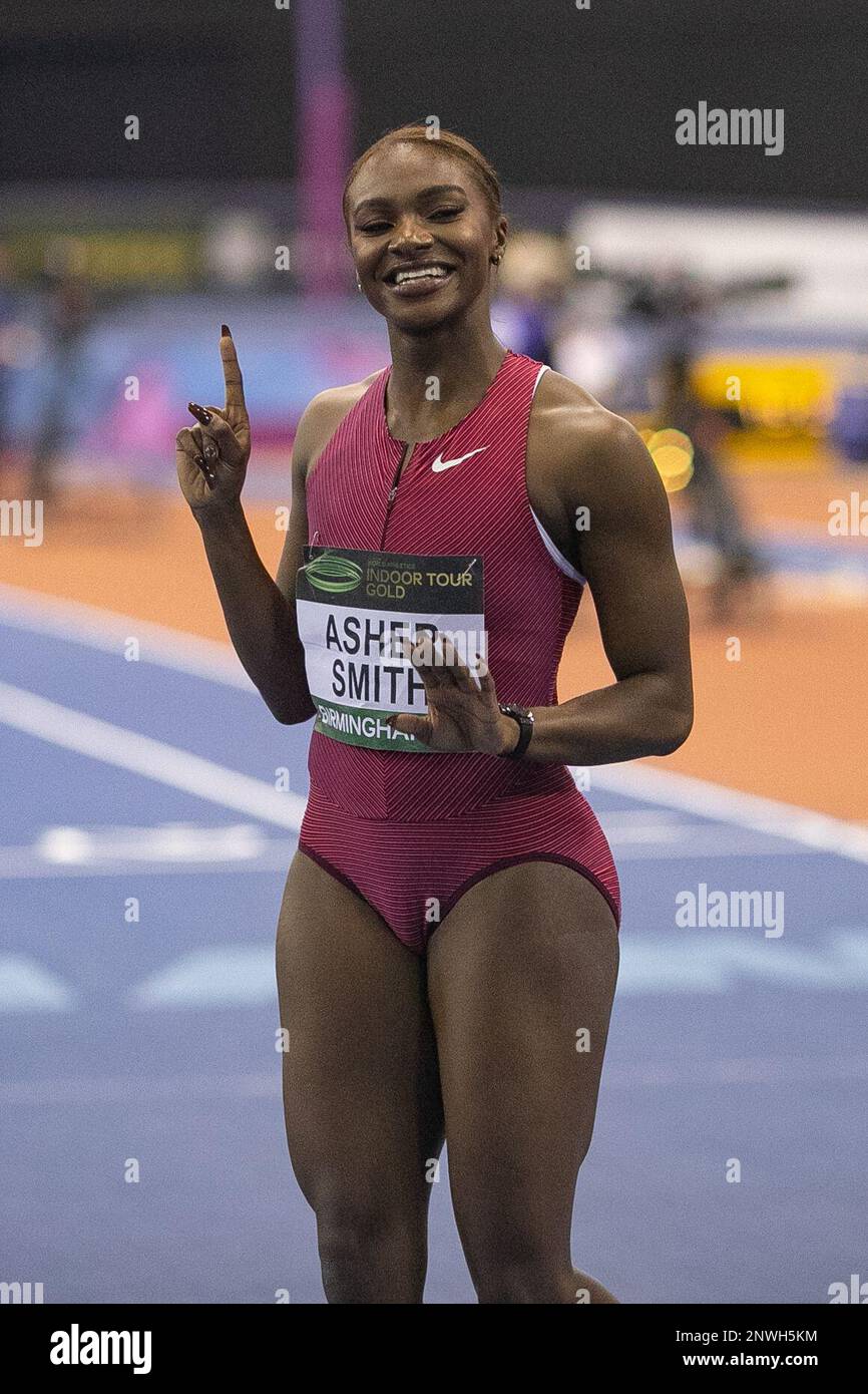 Dina Asher-Smith (GBR) holds up a finger to denote that she's no.1 after winning the Women's 60m ...