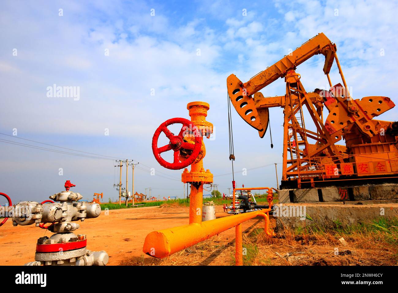 Oil pipes and valves Stock Photo - Alamy