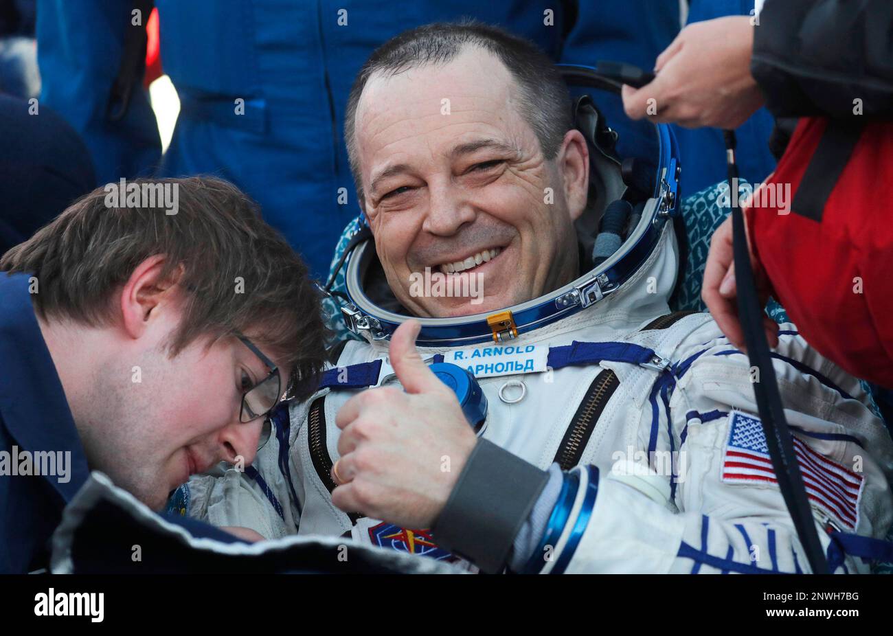 U.S. astronaut Richard Arnold, gestures while smiling shortly after the ...