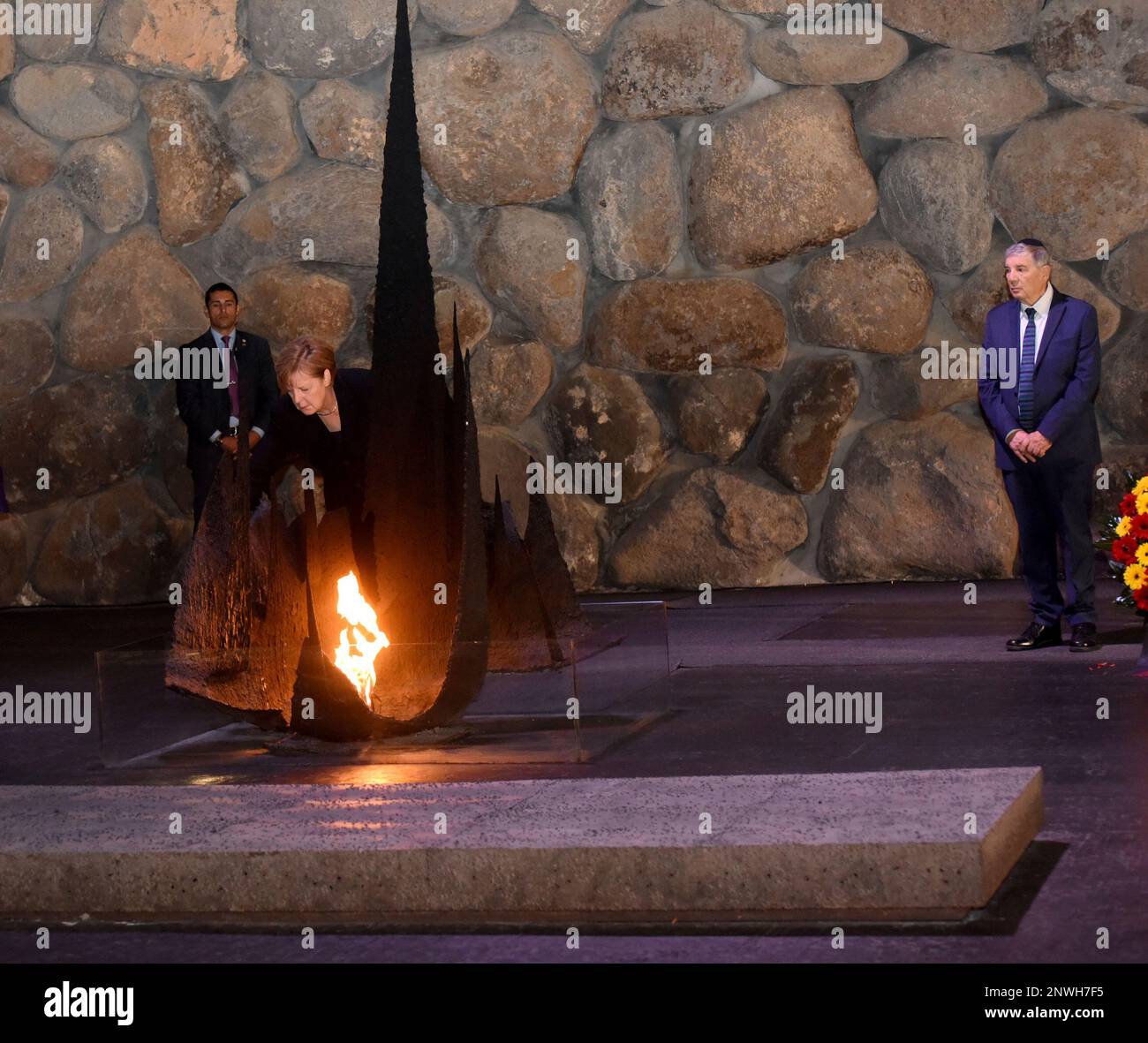 German Chancellor Angela Merkel rekindles the eternal flame in the Hall ...