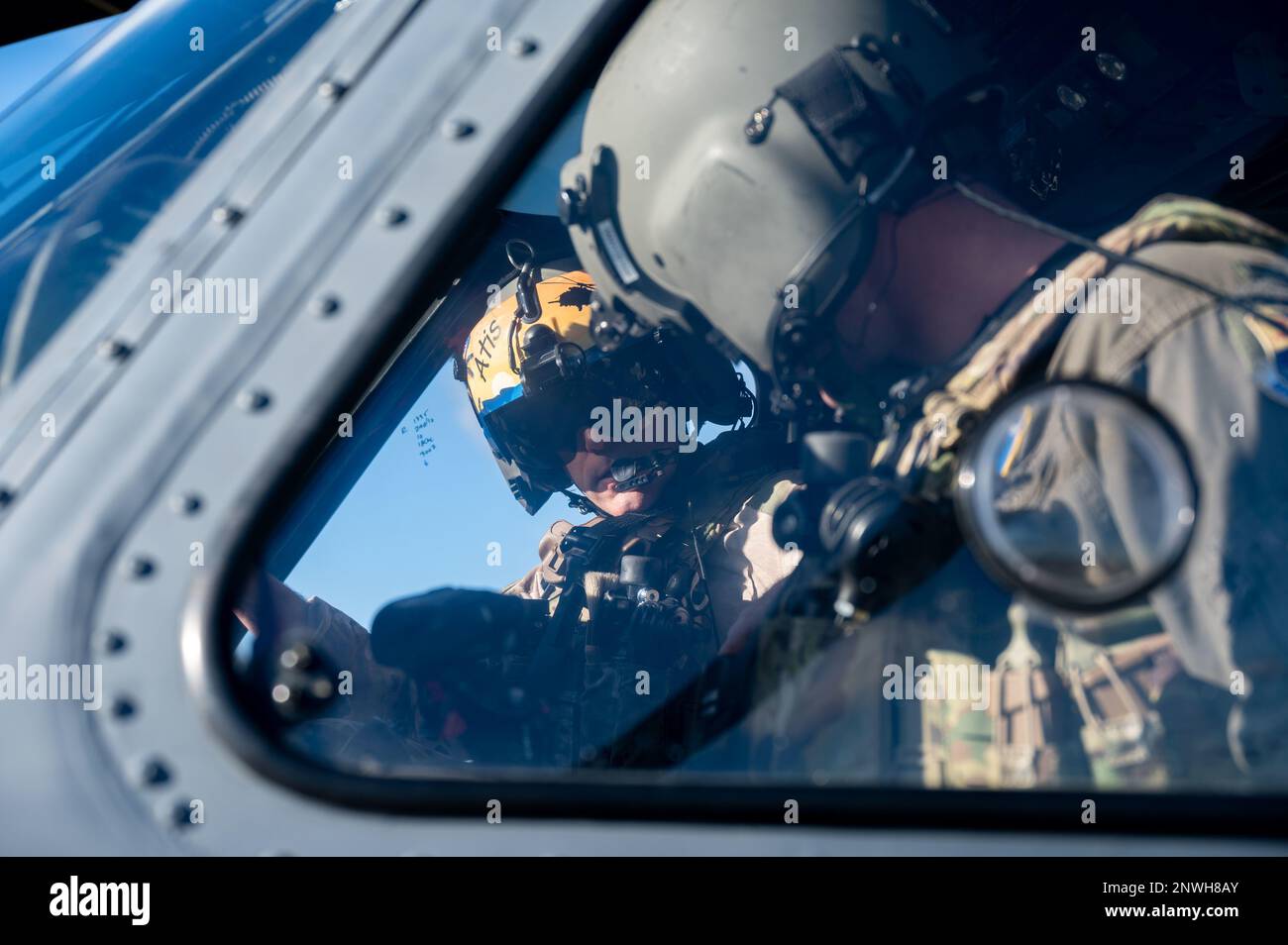 301st Rescue Squadron pilots prepare to take off in an HH-60G Pave Hawk ...