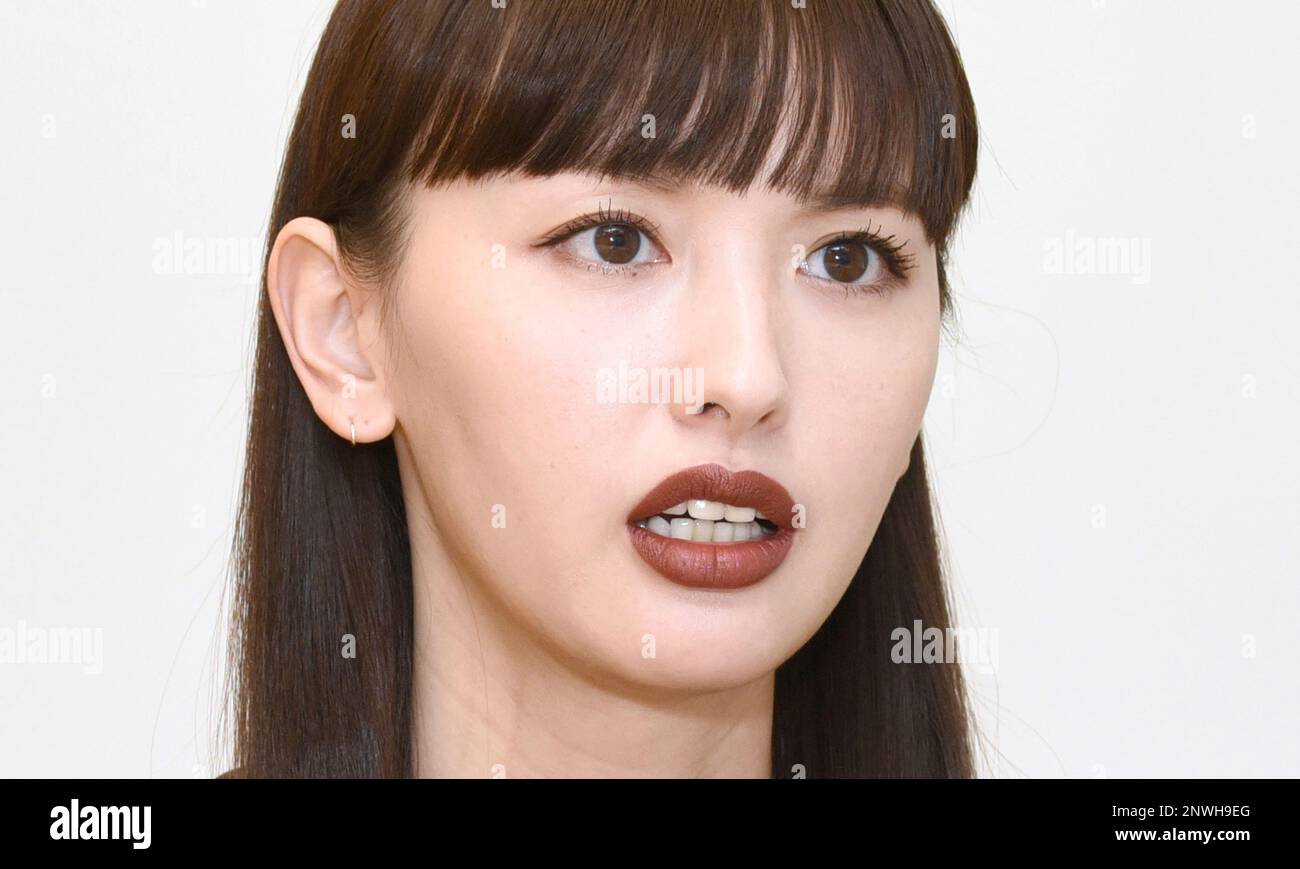 Emi Suzuki, a Chinese-born Japanese model, speaks during an interview ...