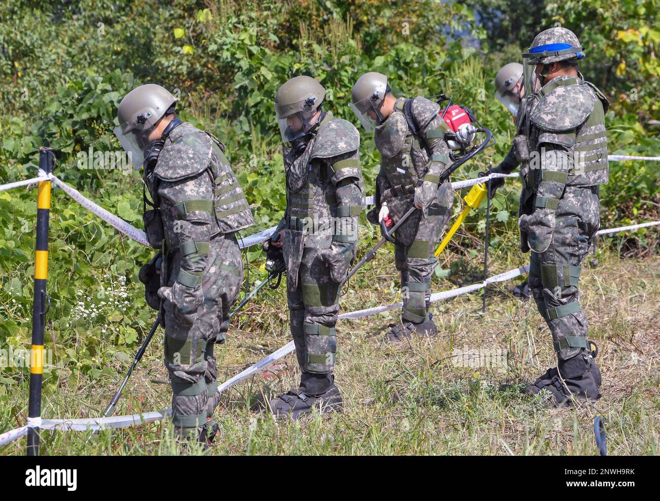 South Korean soldiers search for landmines inside the Demilitarized ...