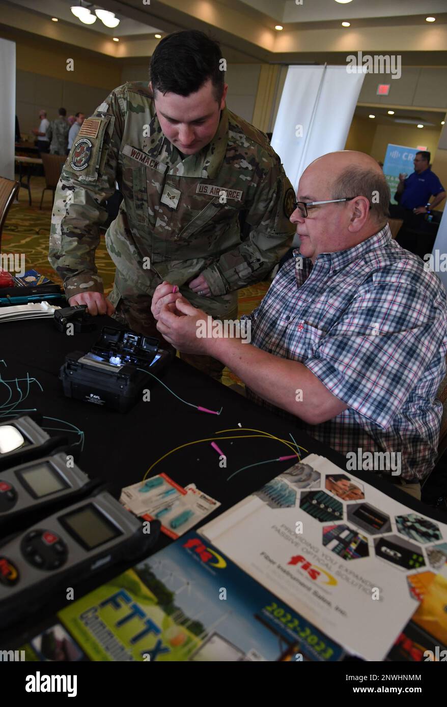 John DeMetro, Fis corporate accounts manager, provides an equipment ...