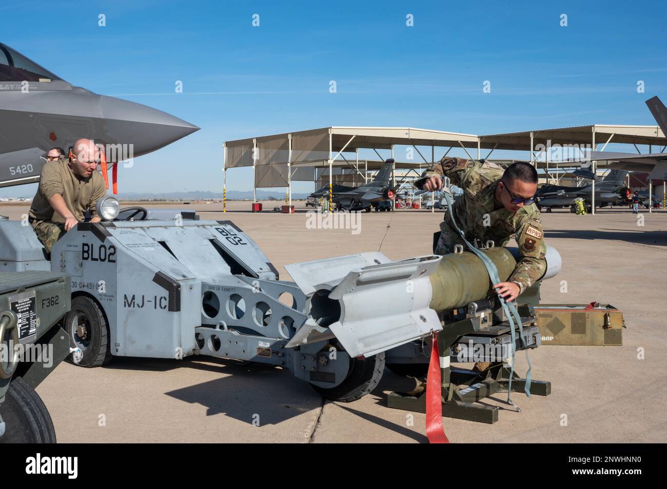 U.S. Air Force Staff Sgt. Emil Paclob and Senior Airman Cameron Canipe, 308th Aircraft ...