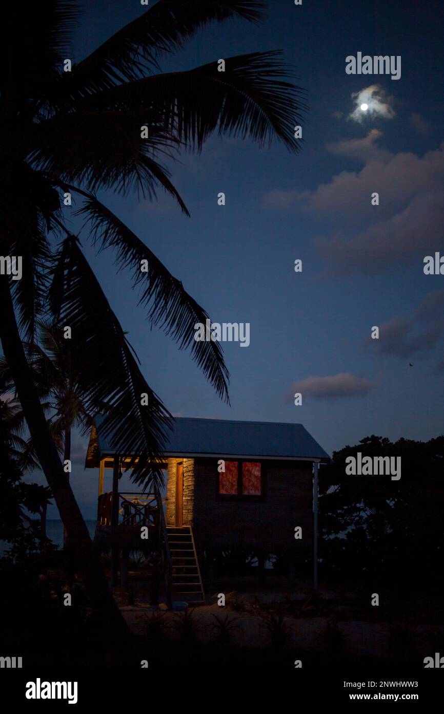 beach fale at resort in Ha'apai, Tonga, at night Stock Photo - Alamy