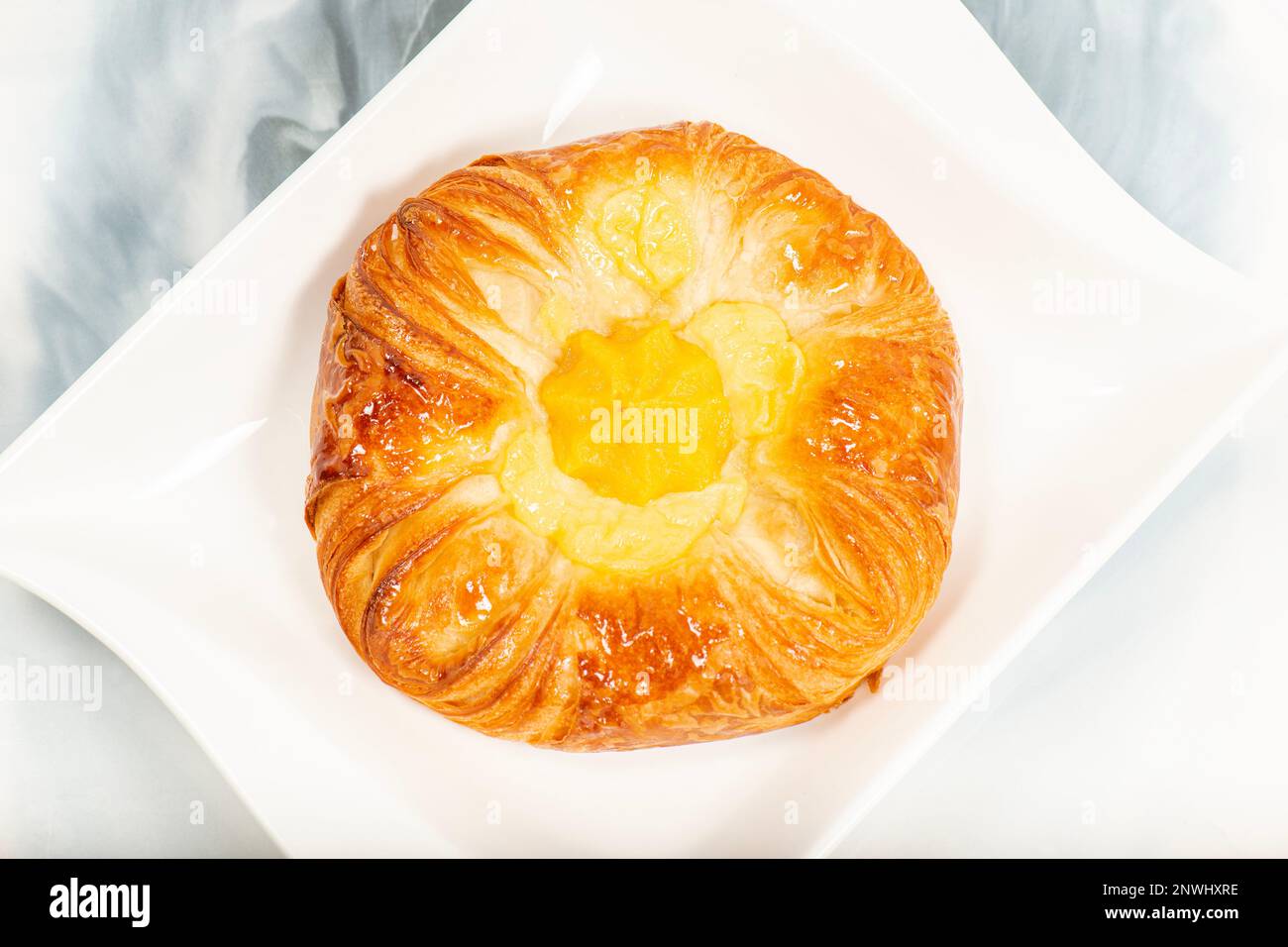 Mouth-watering mango and custard danish brushed with simple syrup Stock ...