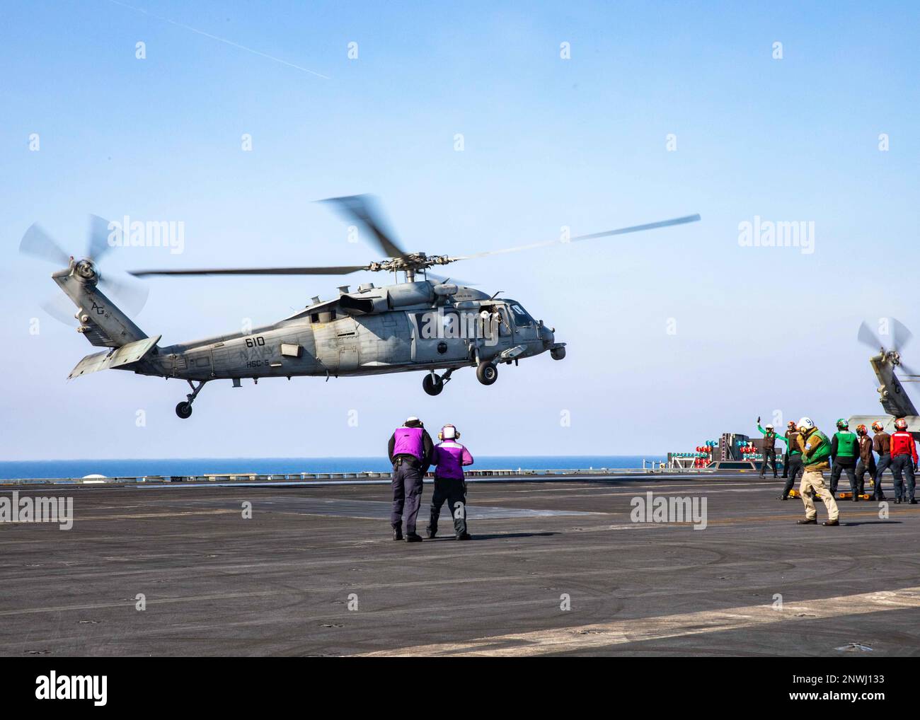 230220-N-IX644-1165 MEDITERRANEAN SEA (Feb. 20, 2023) An MH-60S ...