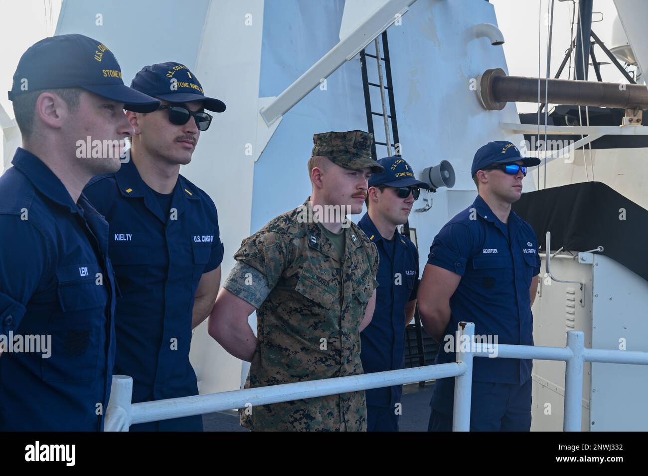 USCGC Stone (WMSL 758) officers and U.S. Marine Corps Capt. Benjamin ...