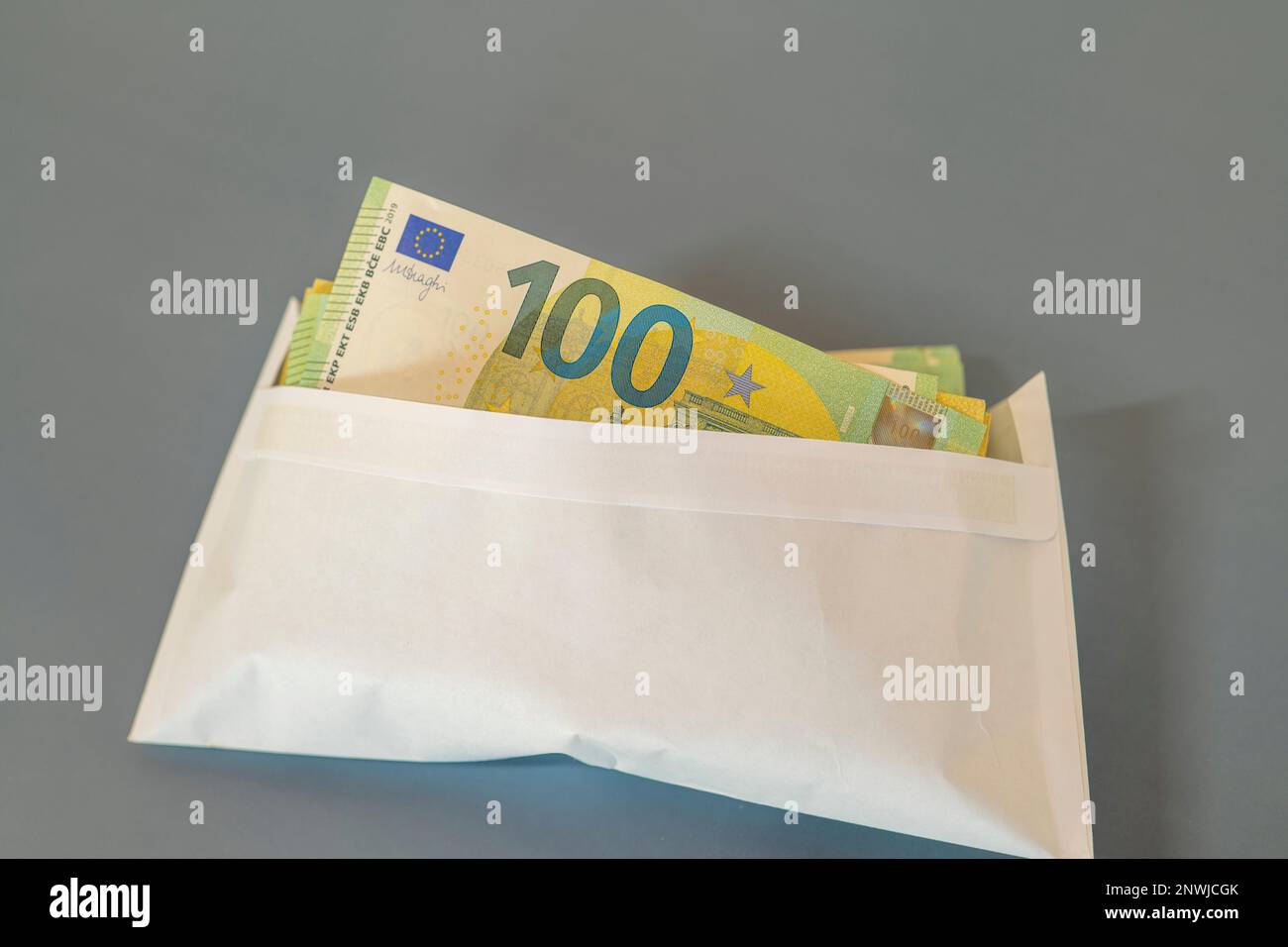 money pack in white envelope.Expenses and incomes in European countries ...