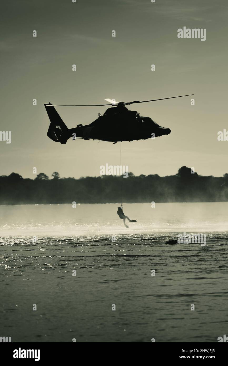 A U.S. Coast Guard Eurocopter MH-65 Dolphin Helicopter from Air station ...
