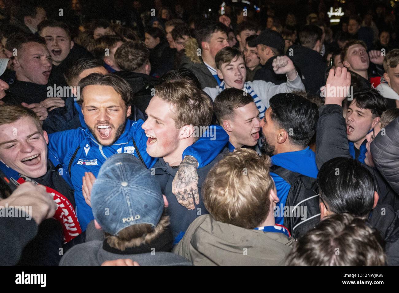 SPAKENBURG - 01/03/2023, Supporters welcome the players of SV ...