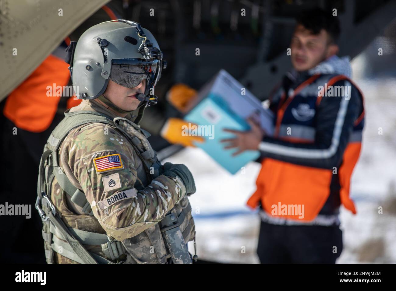 U.S. Army Staff Sgt. Jose Borda, a CH-47F Chinook crew chief, assigned ...