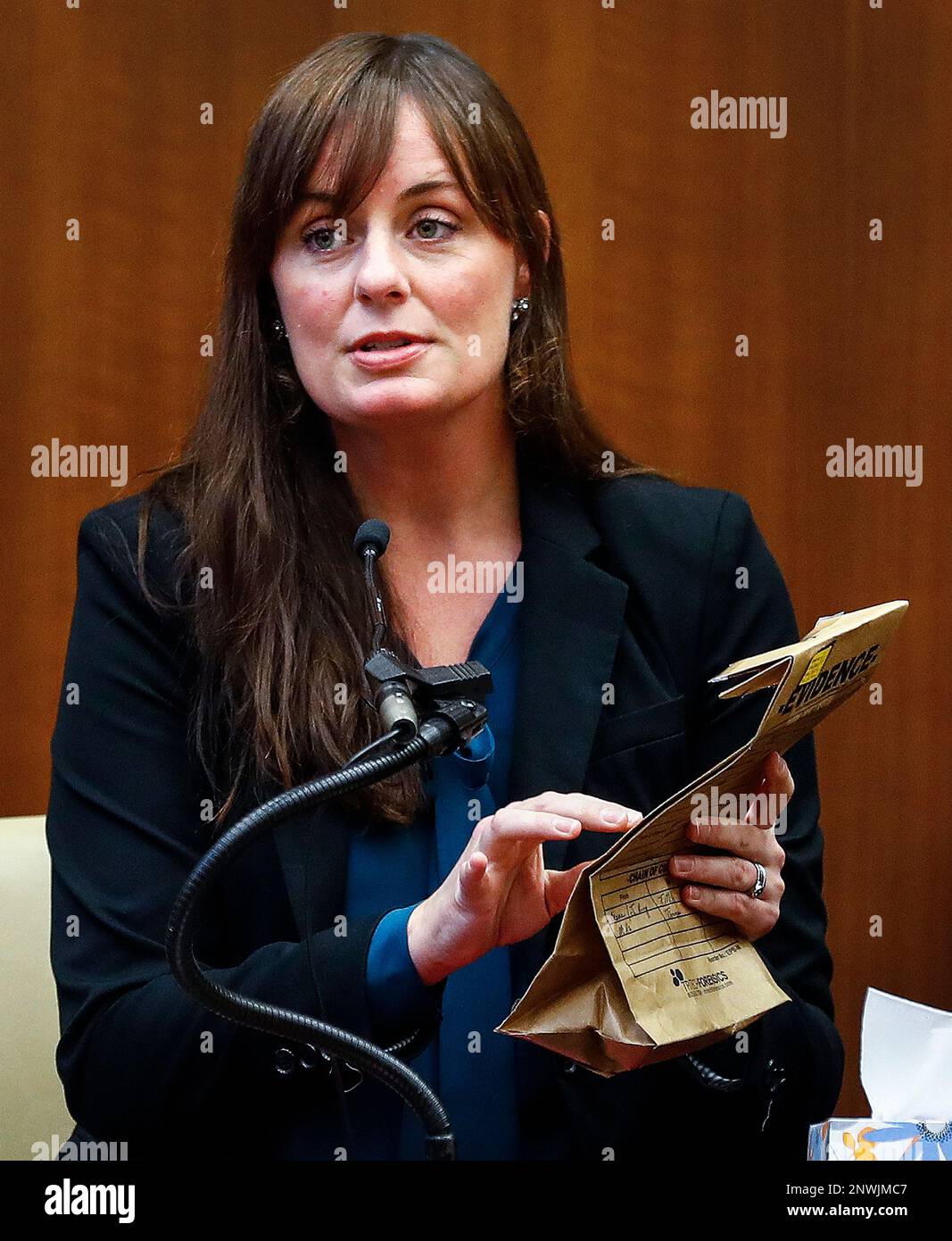 Forensic DNA analyst Kathryn Rodgers testifies during the retrial of ...