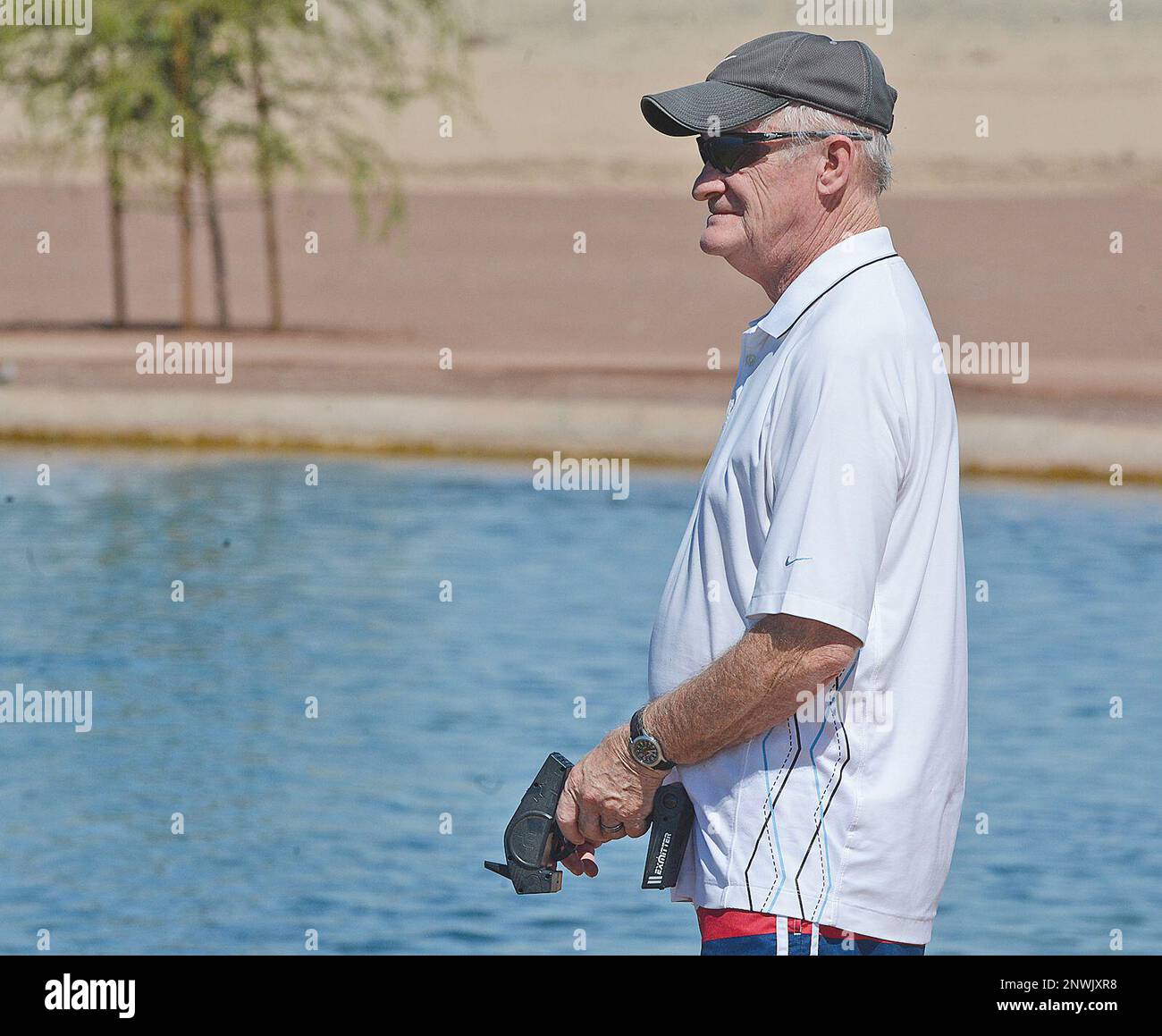 Bob Mathieu keeps an eye on his radio-controlled power boat. (Randy ...