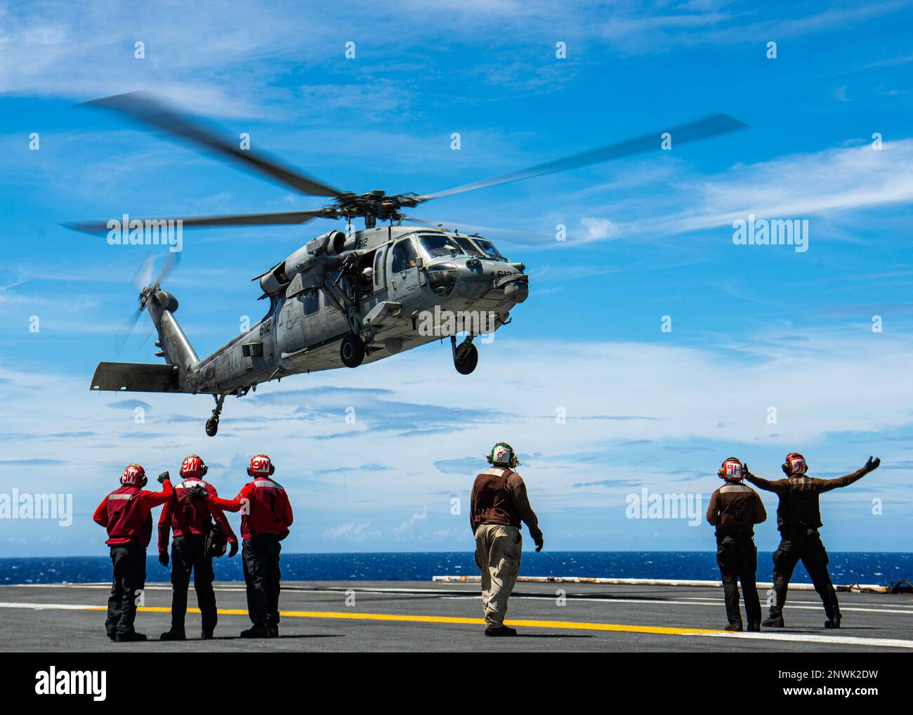230222-N-MH015-1034 PHILIPPINE SEA (Feb. 22, 2023) An MH-60S Sea Hawk ...