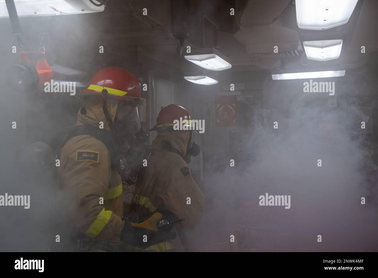 PHILIPPINE SEA (Jan. 28, 2023) Damage Controlman Fireman Gabriel Linn ...