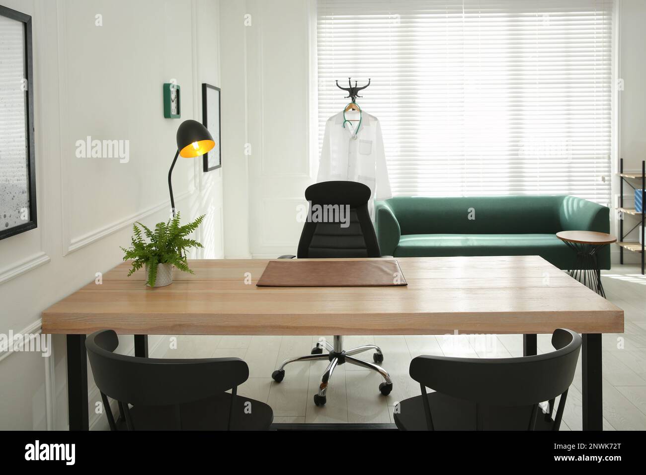 Modern medical office interior with doctor's workplace and sofa Stock ...