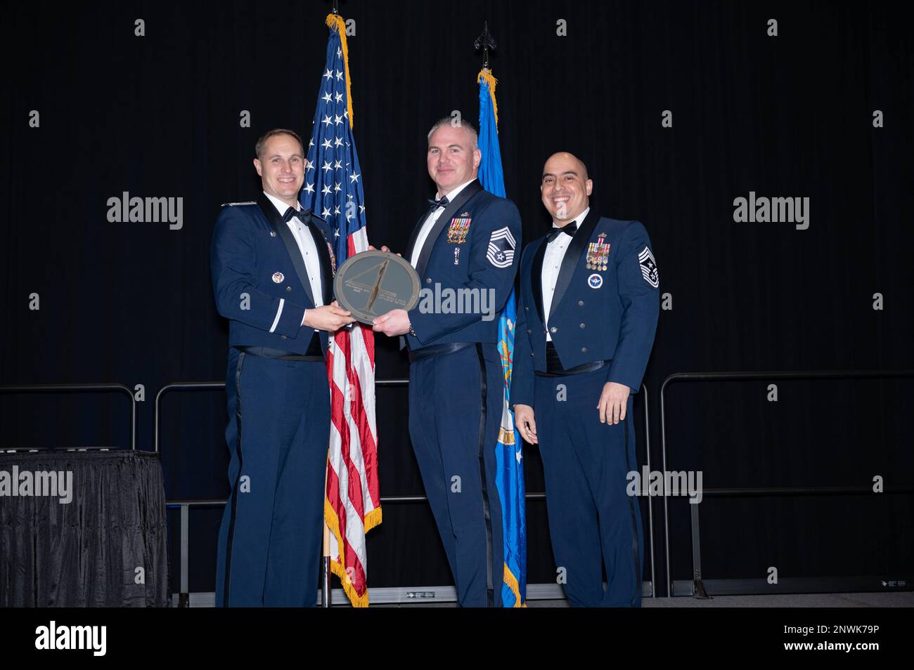 Chief Master Sgt. Michael Bylica, center, 4th Maintenance Group senior ...