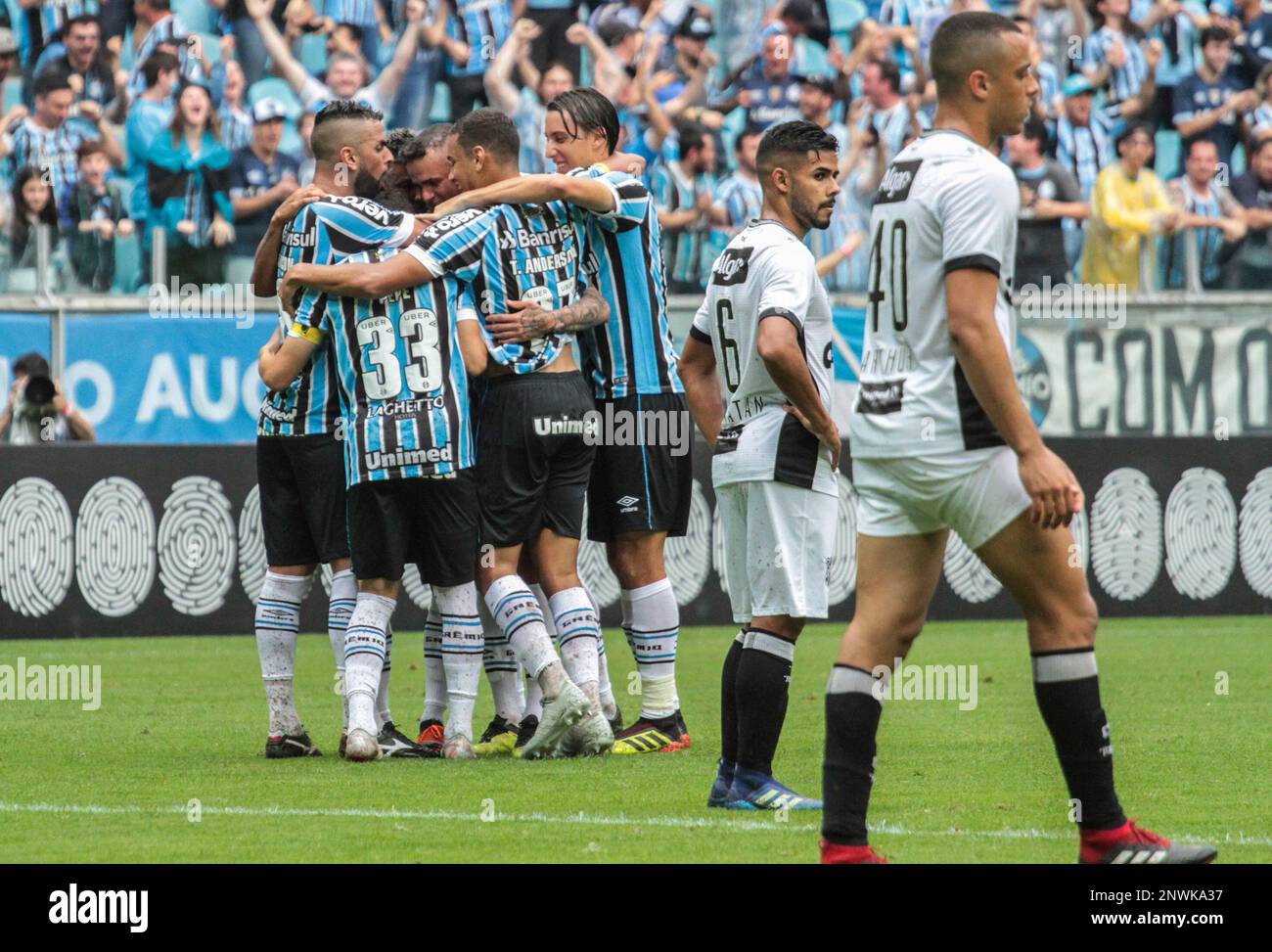 Luan do Gremio celebrates his goal with players of his team during a ...