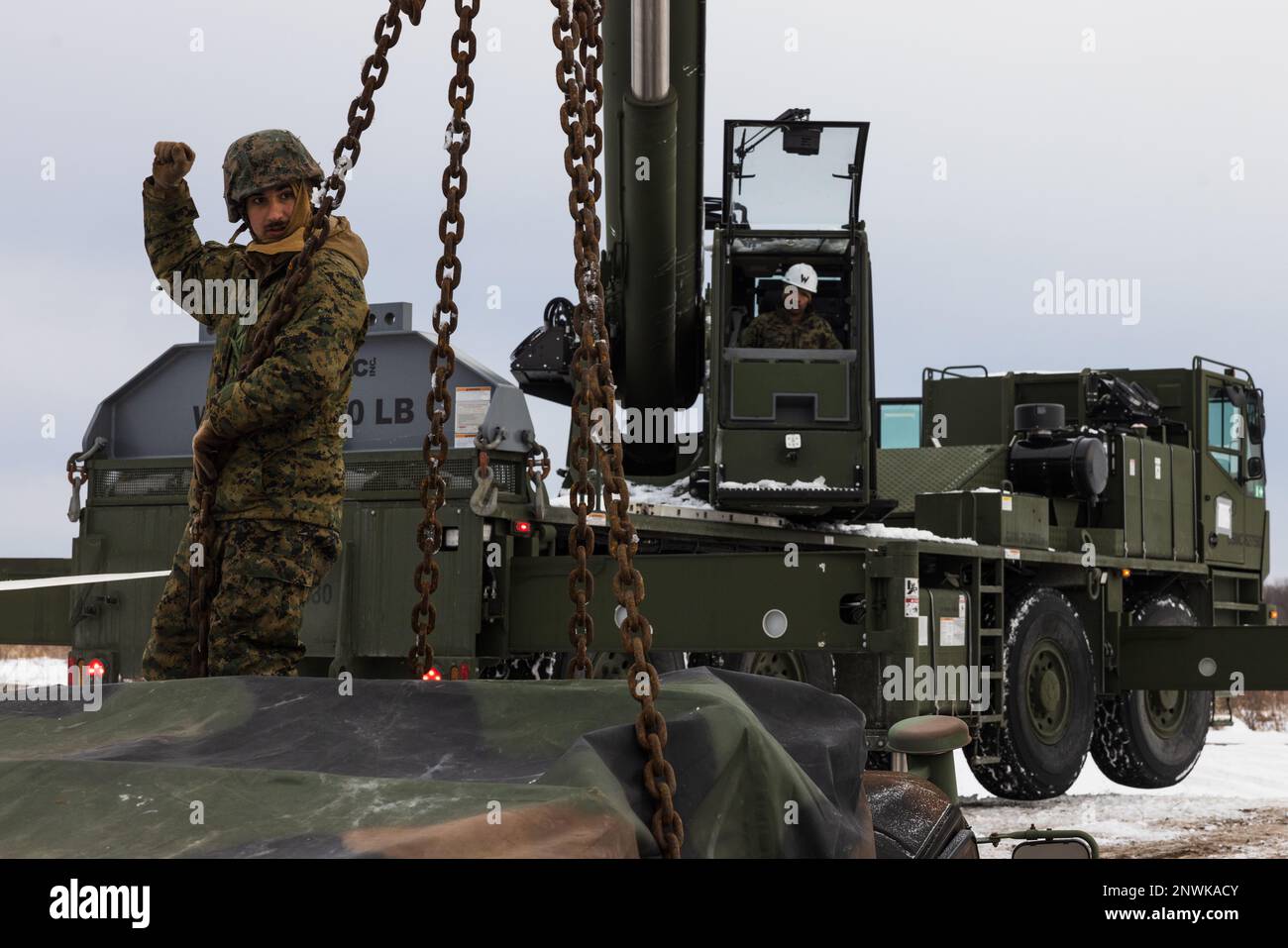 U.S. Marine Corps Lance Cpl. Aslan Aladinov, left, and Lance Cpl ...