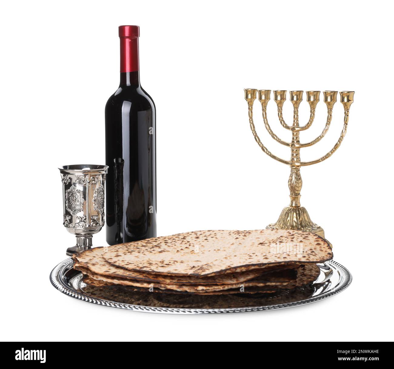 Tasty matzos, wine and menorah on white background. Passover (Pesach ...