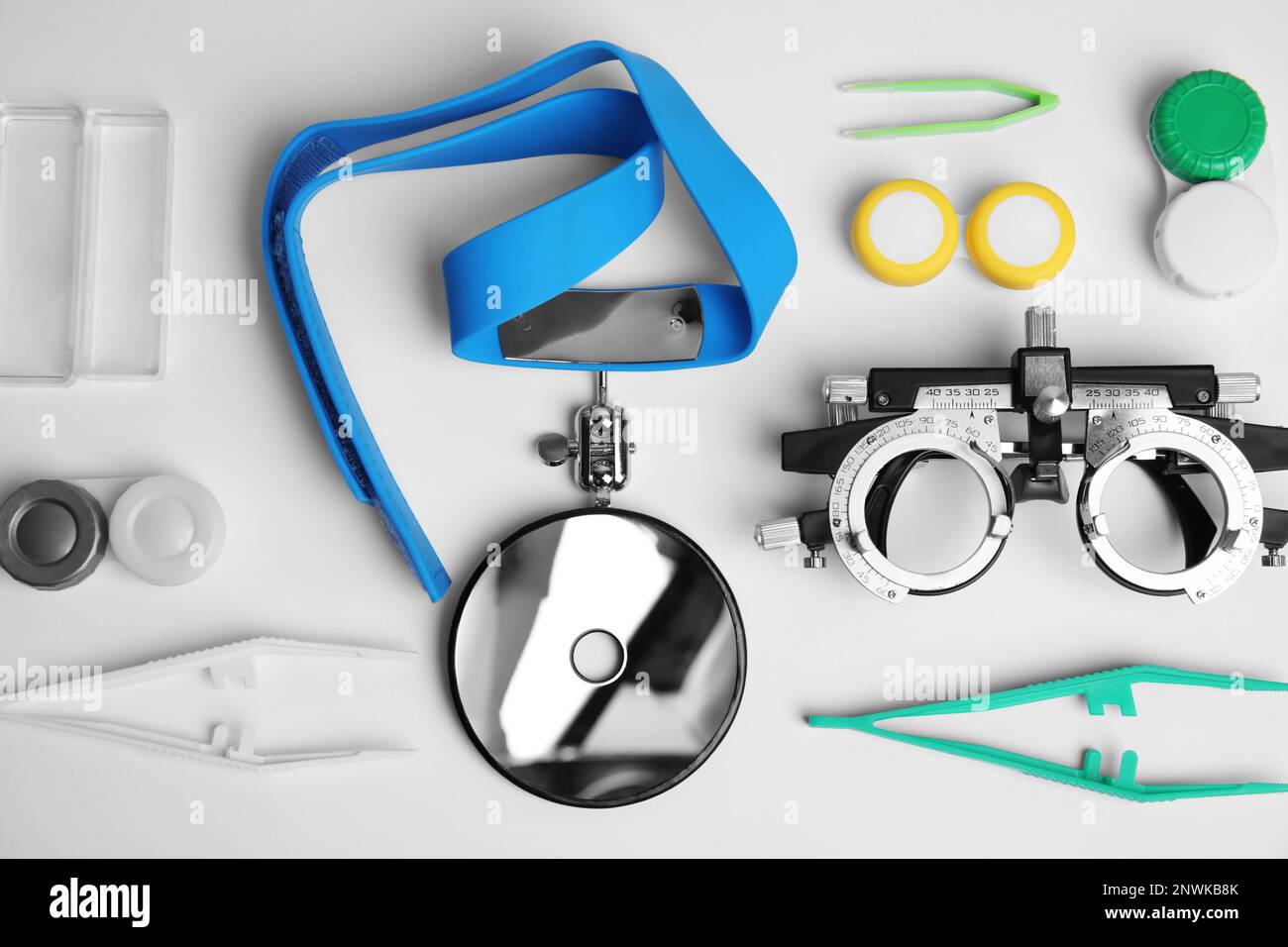 Different ophthalmologist tools on white background, flat lay Stock ...