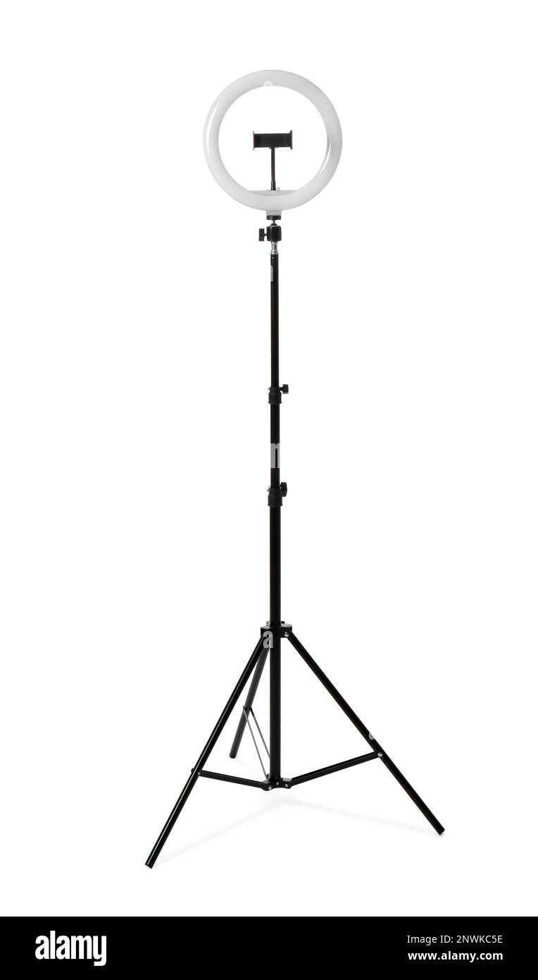 Modern tripod with ring light isolated on white Stock Photo - Alamy