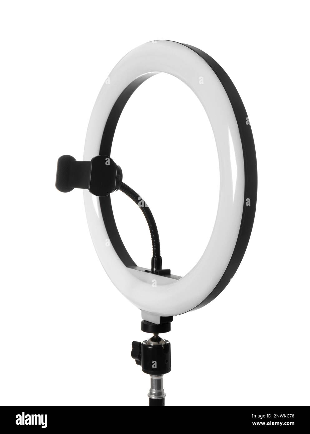 Modern ring light on stand against white background Stock Photo - Alamy