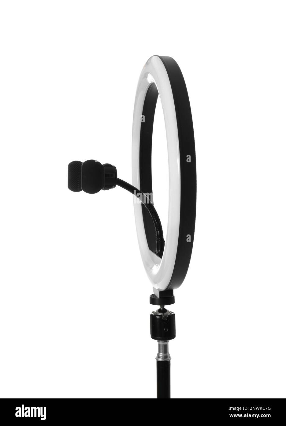 Modern ring light on stand against white background Stock Photo - Alamy