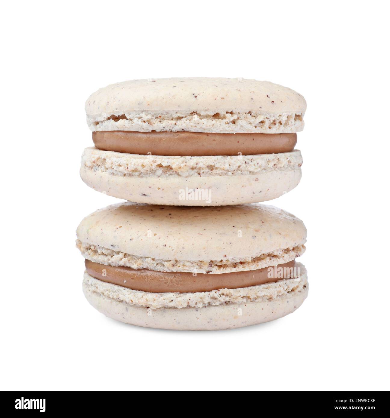 Beige macarons on white background. Delicious dessert Stock Photo - Alamy
