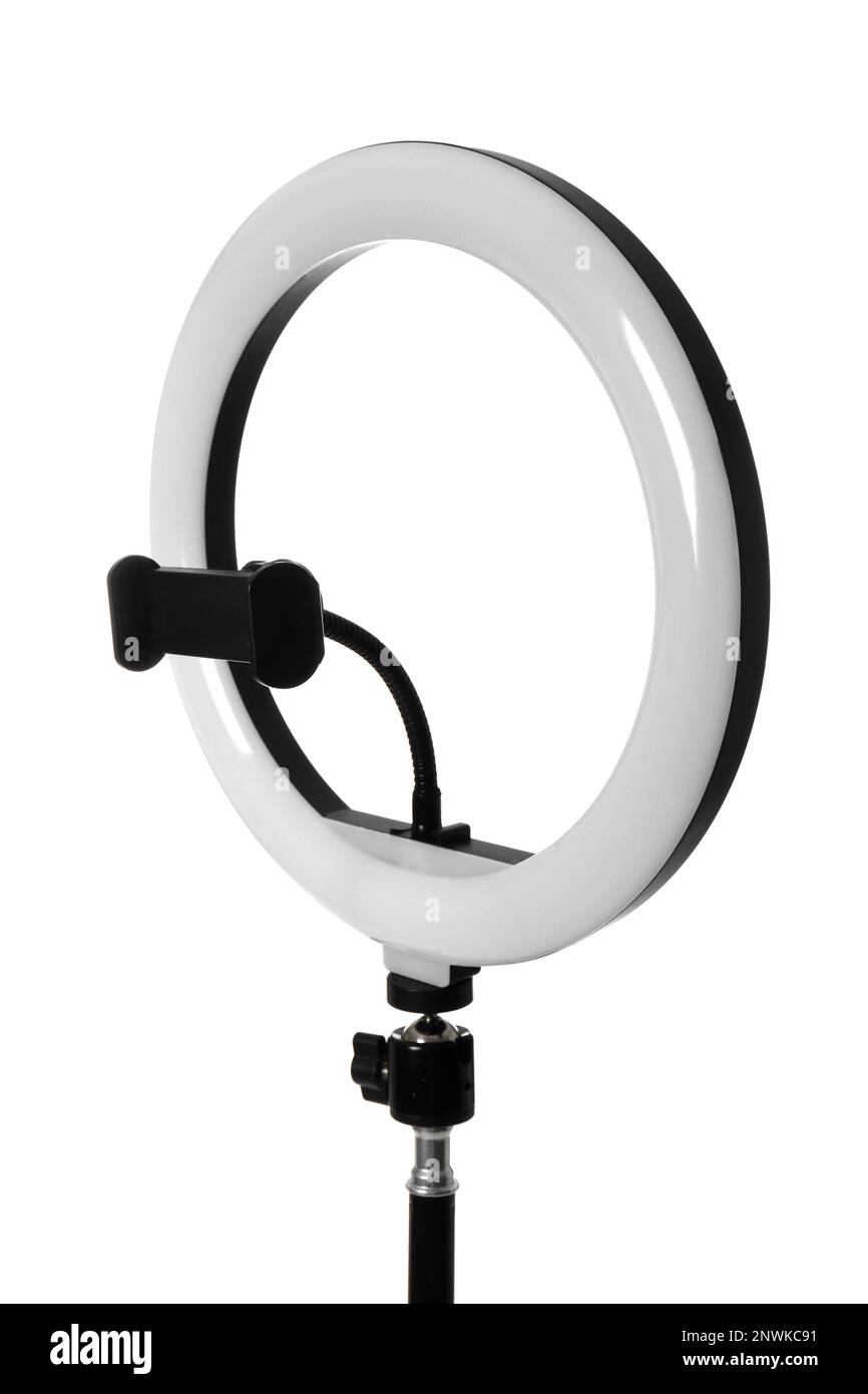 Modern ring light on stand against white background Stock Photo - Alamy