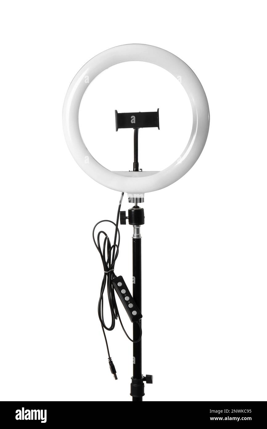 Modern ring light on stand against white background Stock Photo - Alamy