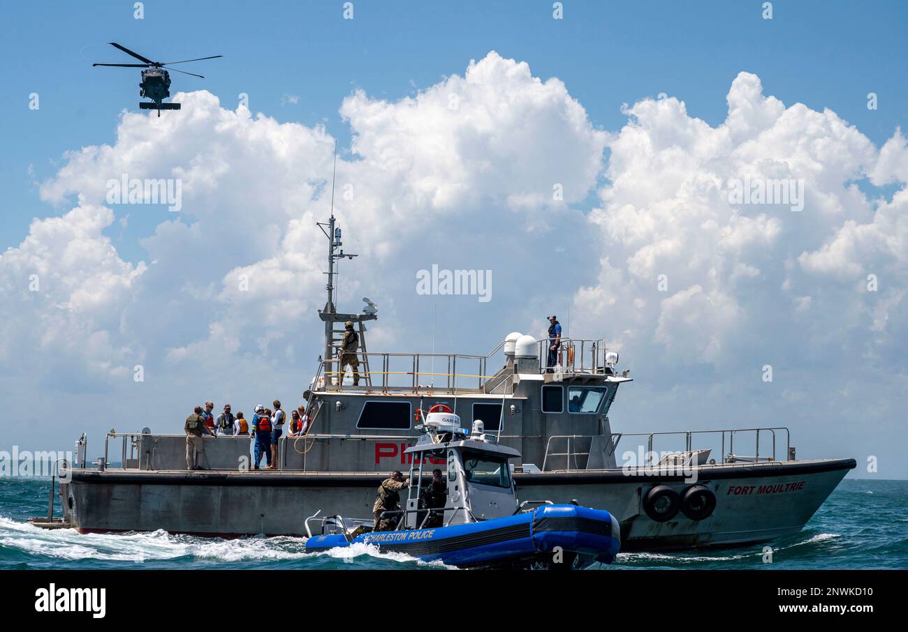 A Charleston Harbor Police boat meets a Charleston Harbor Pilot boat ...