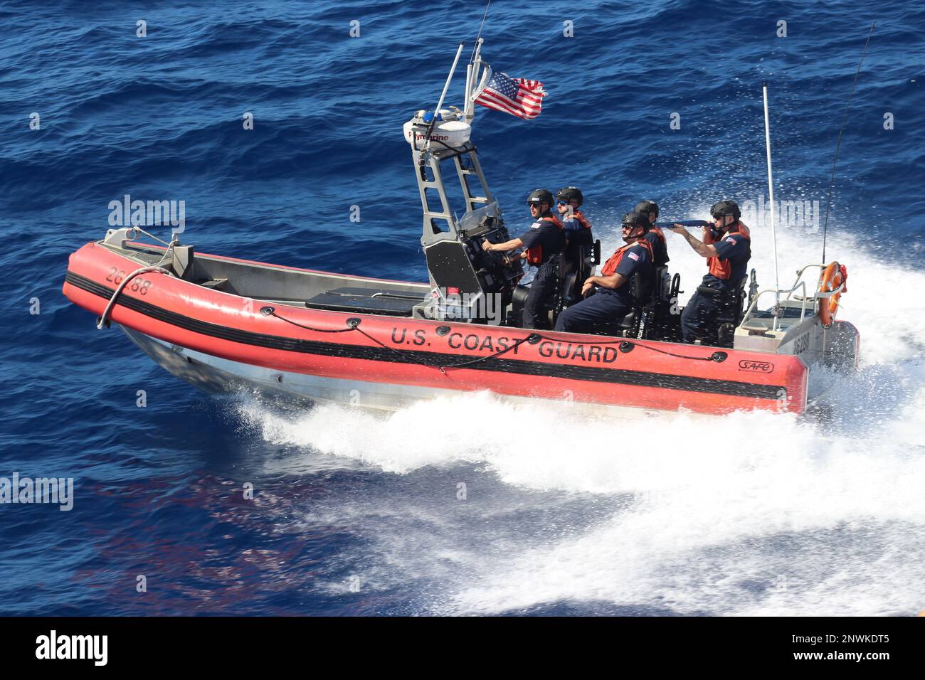 A USCGC Reliance (WMEC 615) boat crew performs non-compliant vessel ...