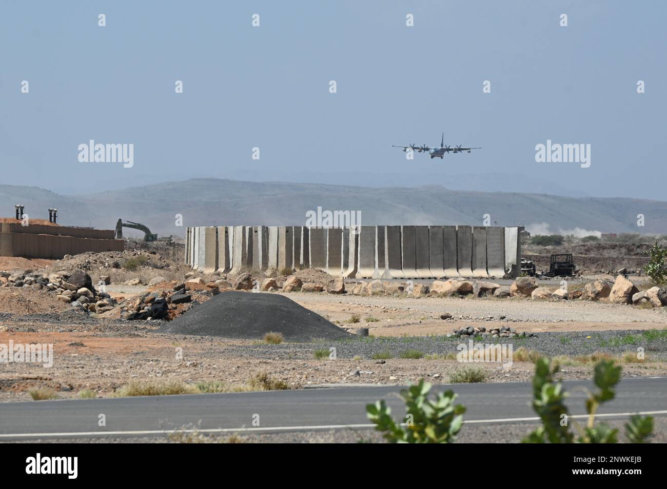 A U.S. Marine Corps KC-130J lands at the refueling site in support of a ...