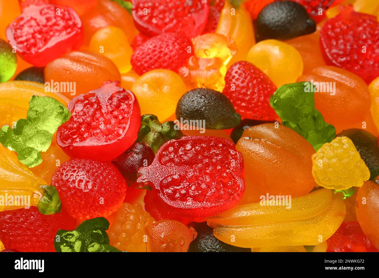 Mix of different delicious gummy candies as background, closeup Stock ...