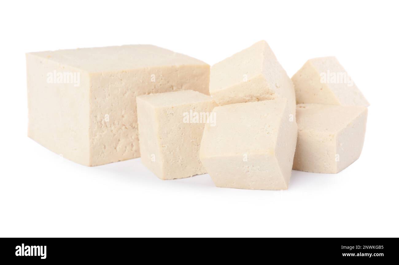 Different raw tofu pieces on white background Stock Photo - Alamy