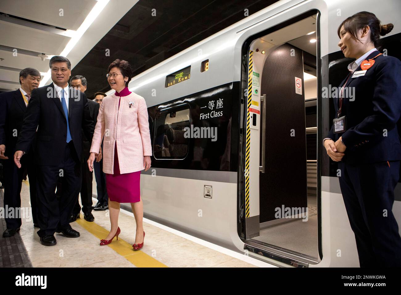 Ma Xingrui, governor of Guangdong Province, front row left, and Carrie ...