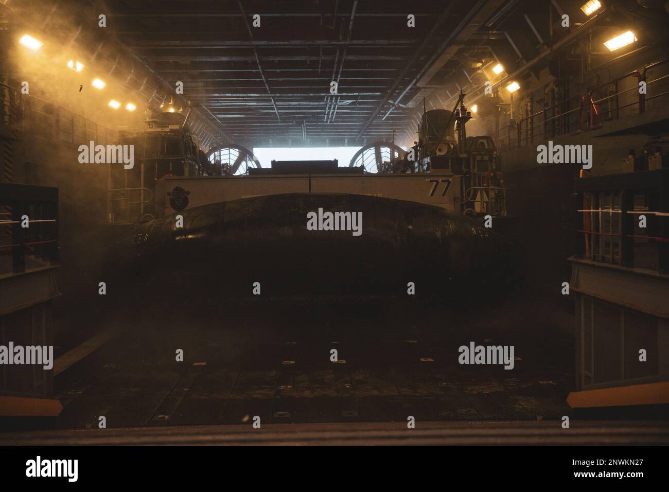 A U.S. Naval Landing Craft Air Cushion (LCAC) disembarks the amphibious ...