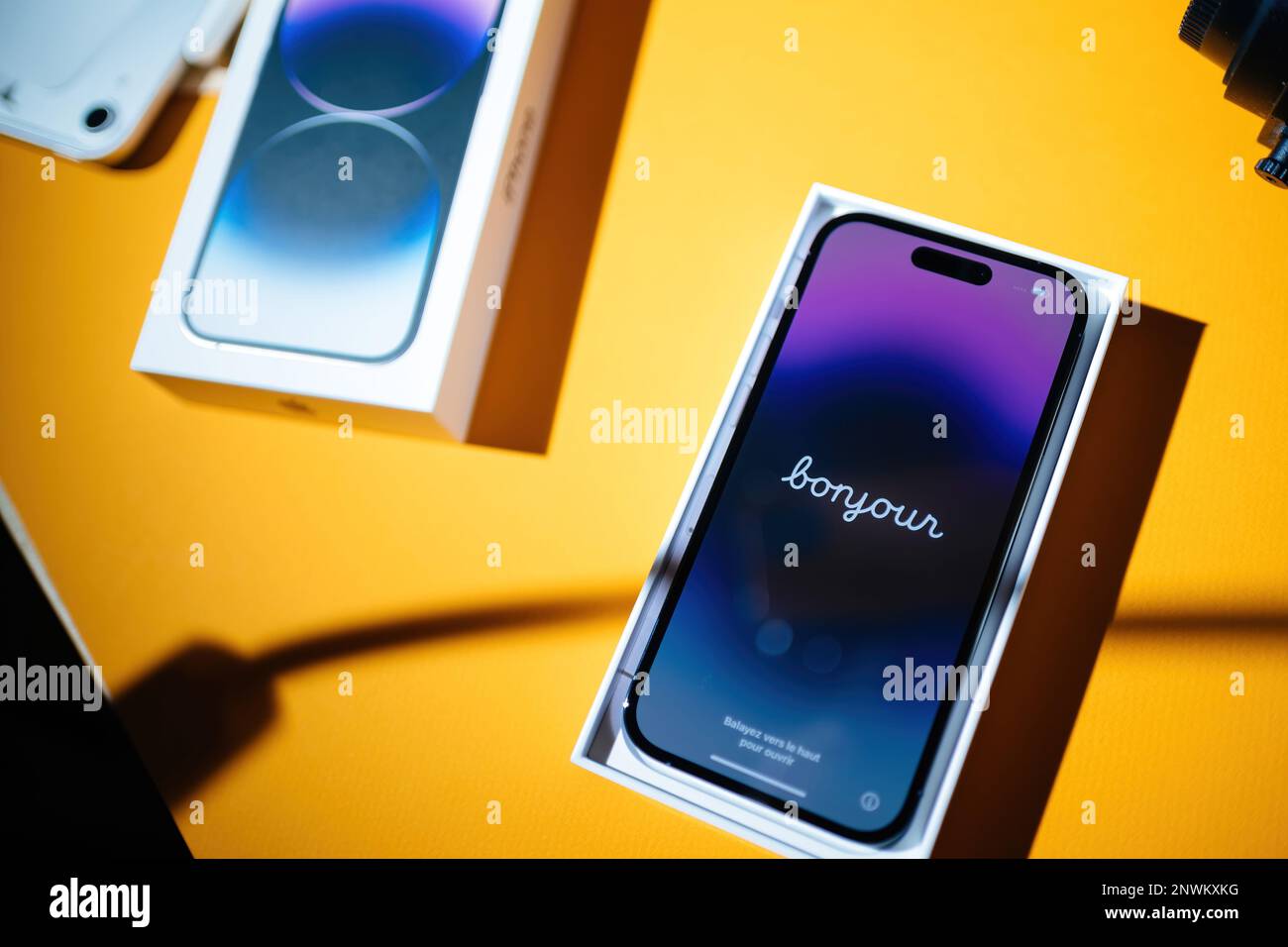 Paris, France - Sep 17, 2022: Unboxing of new Apple Computers iPhone 14 Pro with Bonjour French ...