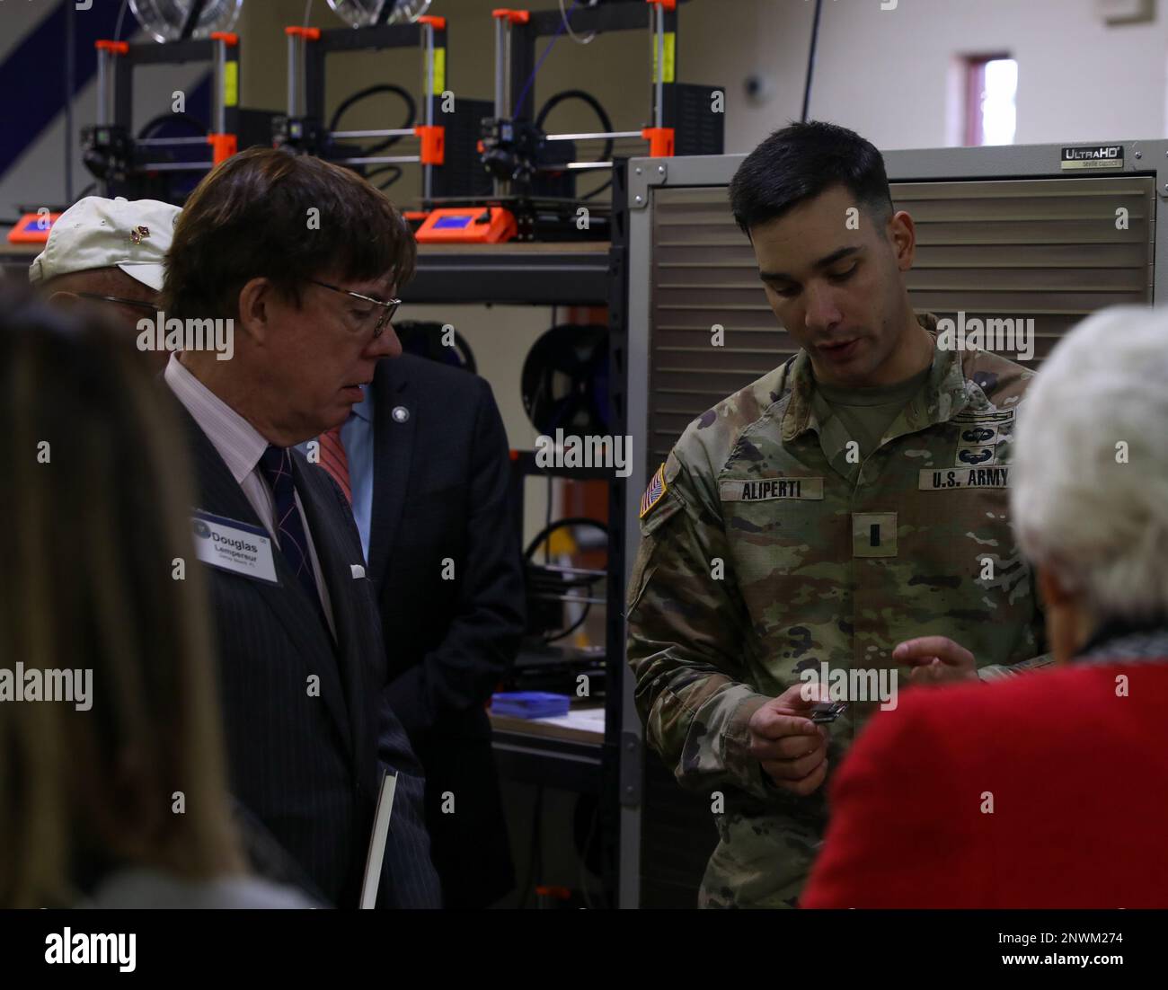 Douglas R. Lempereur, left, a member of Defense Orientation Conference ...