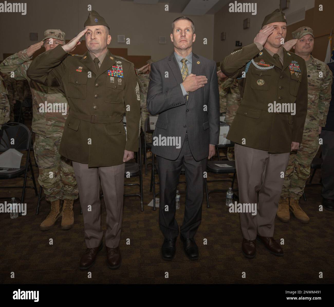 (From left to right) Command Sgt. Maj. Christopher Shaiko, command sergeant major of 1st Armored ...