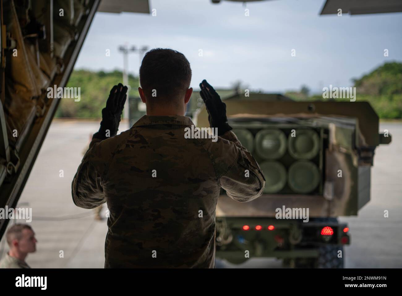 A loadmaster assigned the 1st Special Operations Squadron marshals an ...