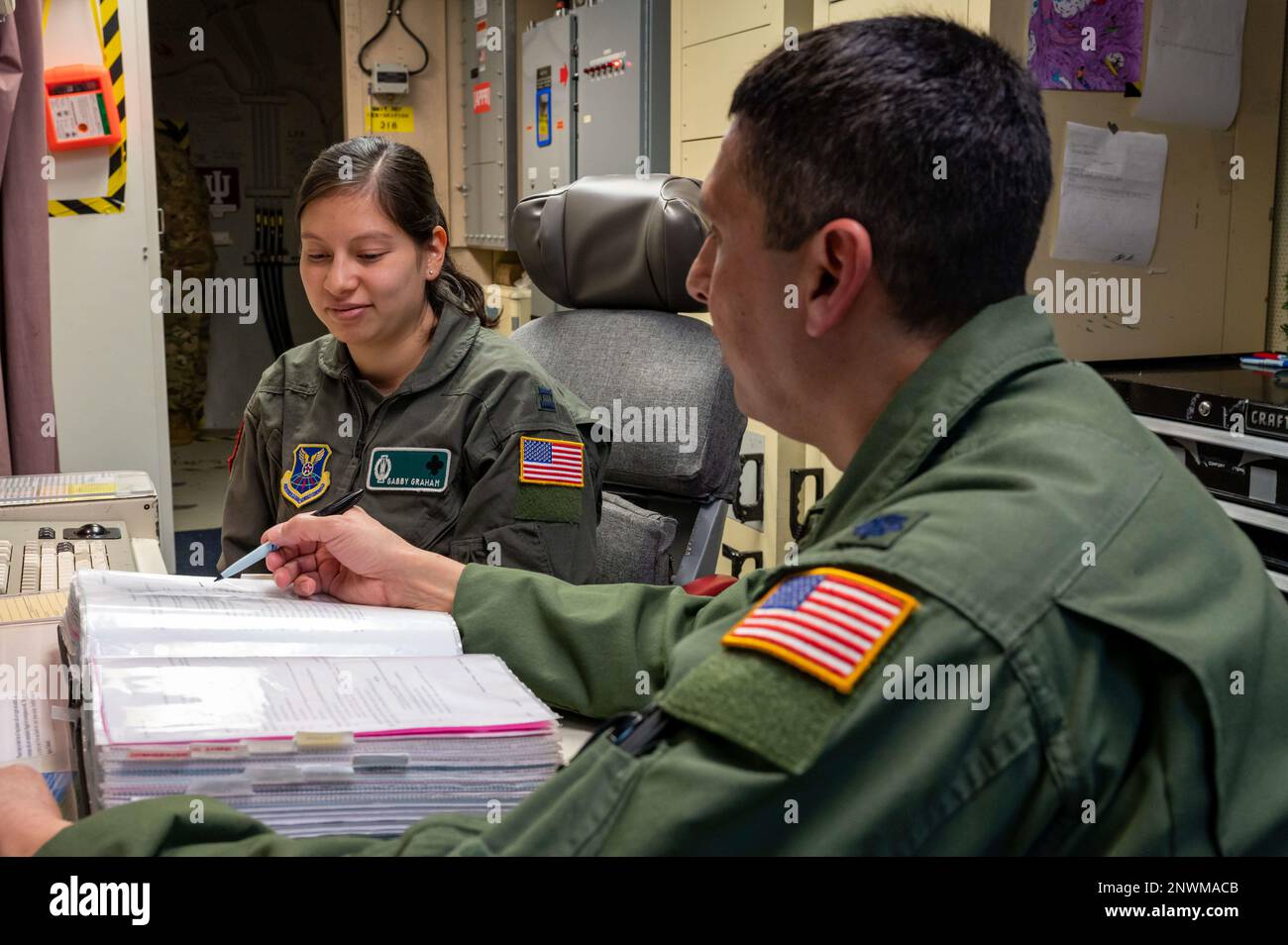 Lt. Col. Raymundo Vann and Capt. Gabriella Graham check their procedure ...
