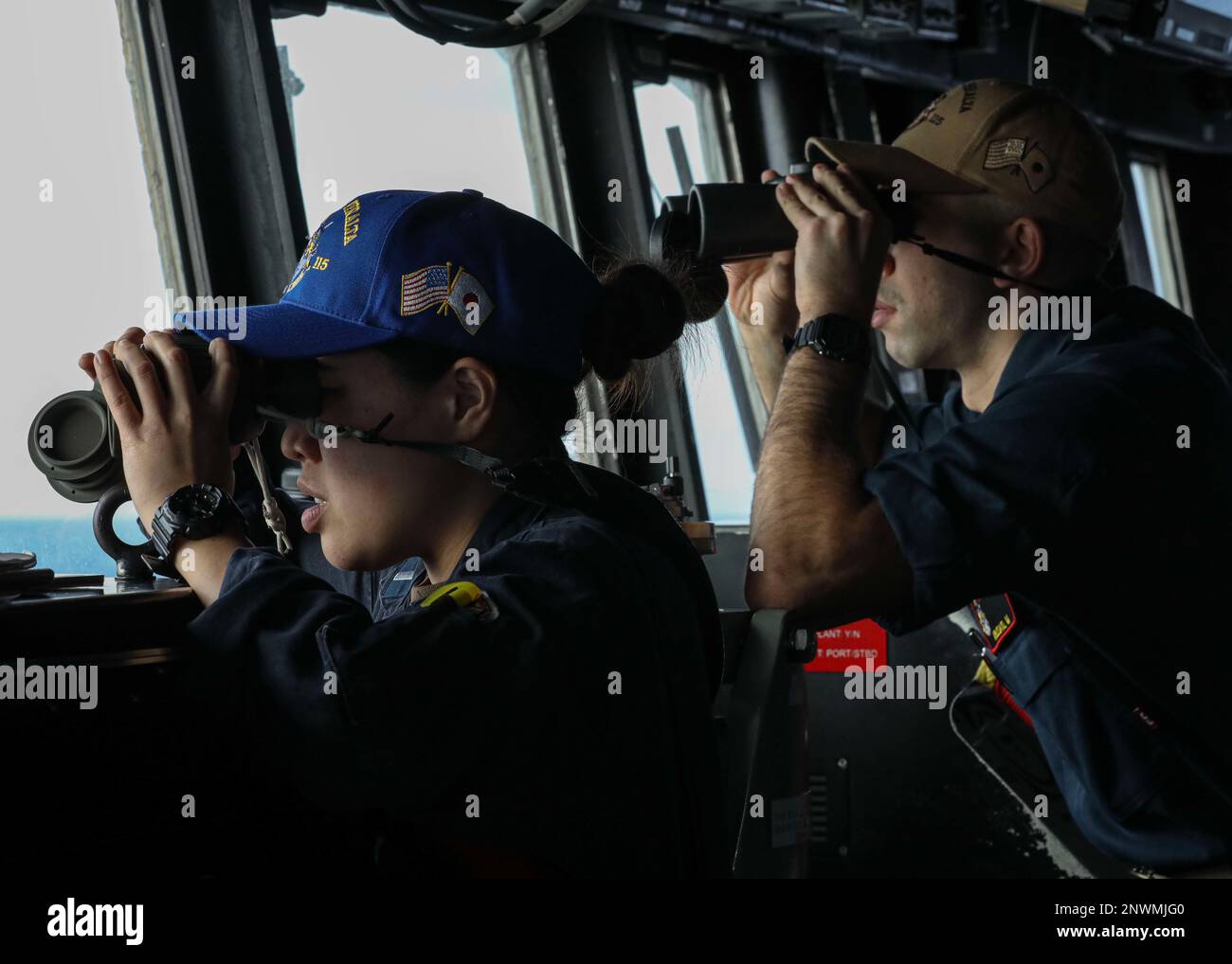 PHILIPPINE SEA (Jan. 18, 2023) – Lt. j.g. Chunchun Waskin (left), from ...
