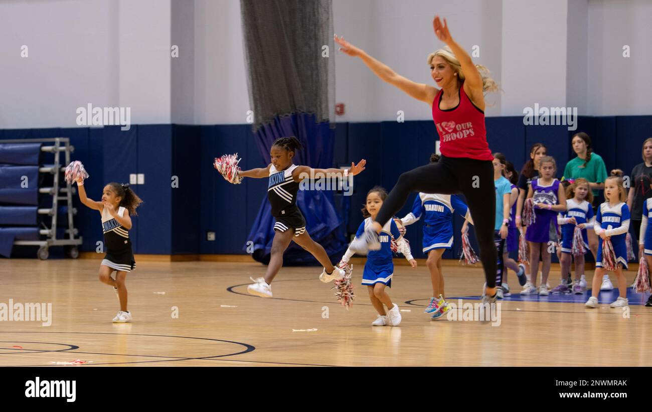 Marine Corps Air Station Iwakuni children conduct across-the-floor warm ...