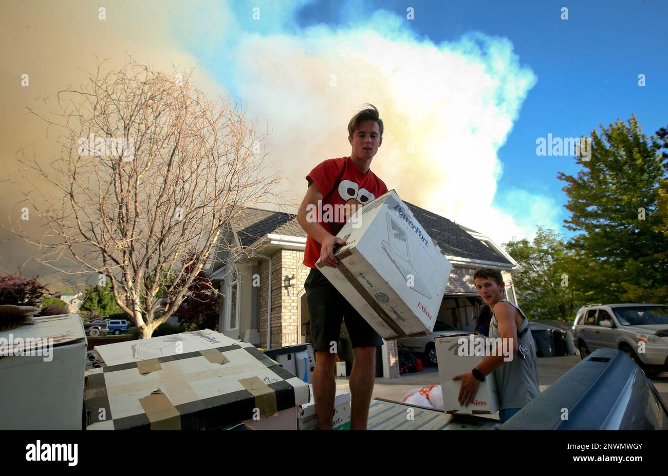 In this Thursday, Sept. 13, 2018, photo Brandon Morgan, 17, center ...