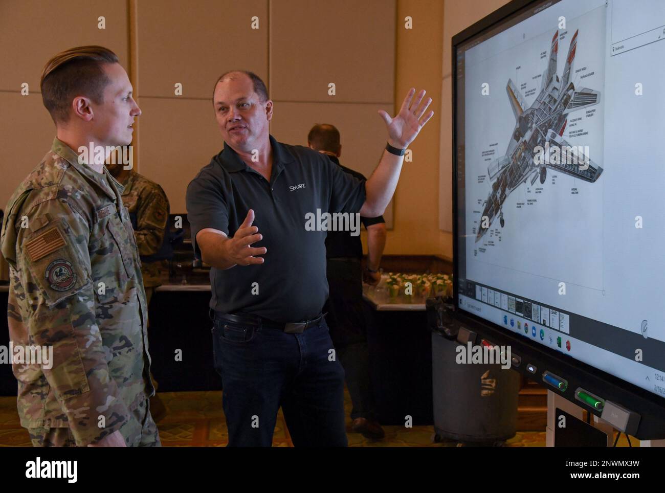 Rick English, Smart technologies channel manager, provides an equipment overview to U.S. Air ...